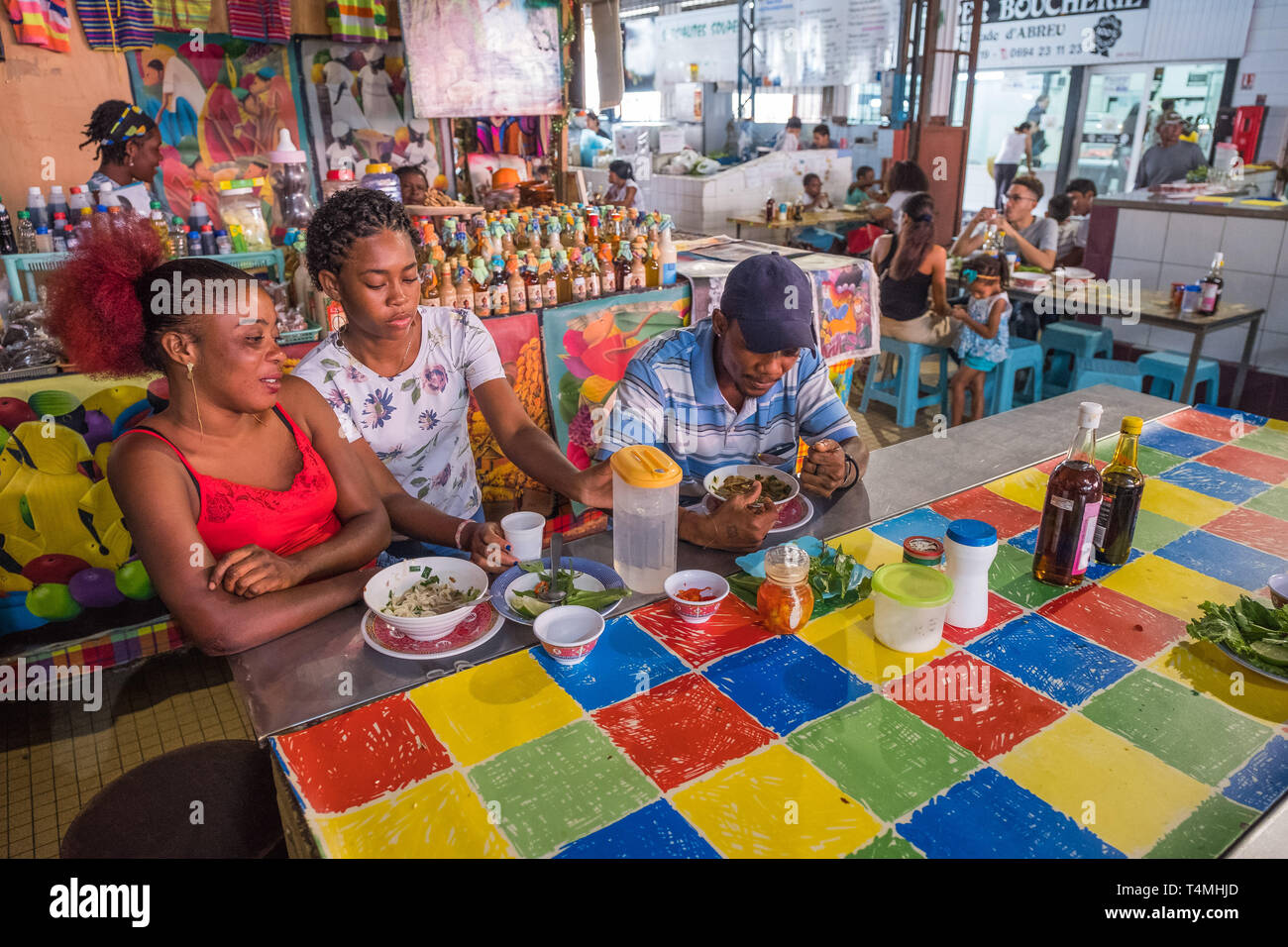 People eating inside Cayenne market, Guyana, Cayenne, France Stock ...
