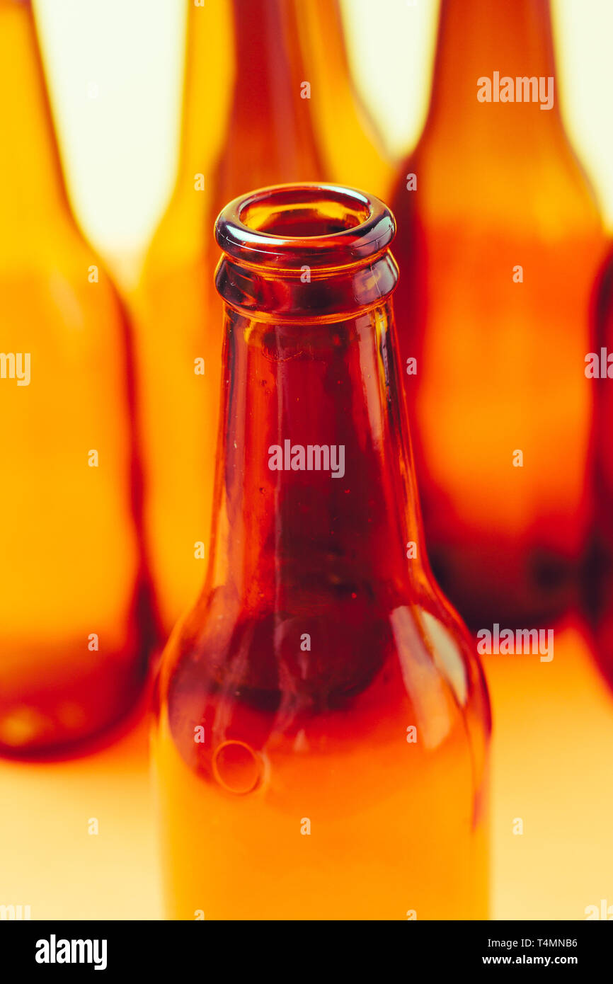 brown glass bottles for advertising still lifes Stock Photo - Alamy
