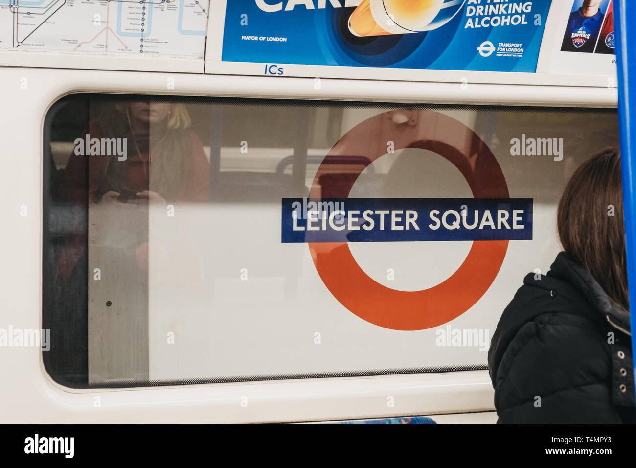 London, UK - April 13, 2019: View of Leicester Square station name sign ...