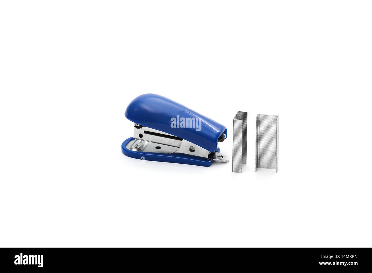 Blue office stapler with metal brackets are isolated on white ...