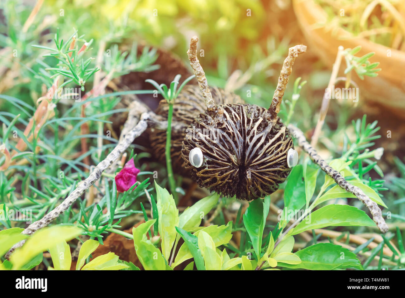 An artificial ant statue made from coconut, decorated on trees in the ...