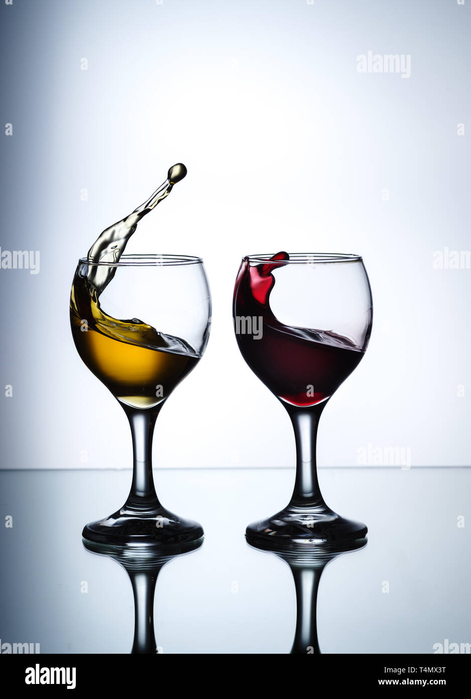 stream of wine being pouring into a glass closeup, wine, splashing ...