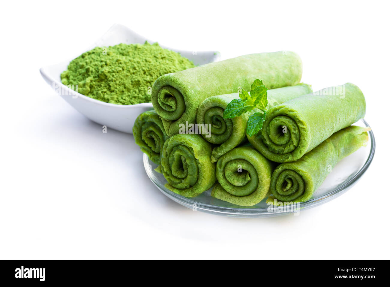 Matcha green tea crepe on black stone table Stock Photo - Alamy