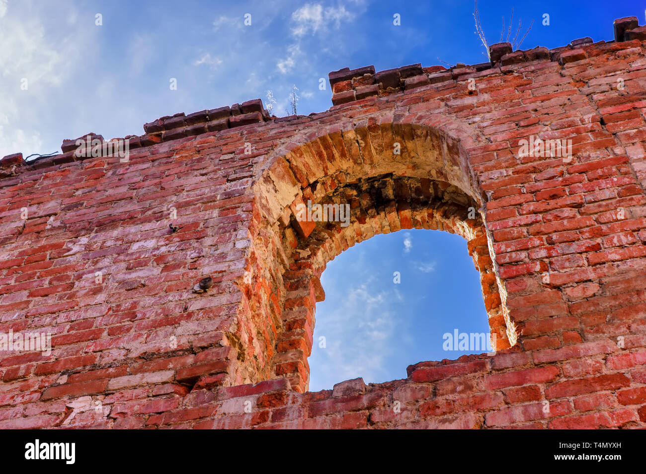 The ruins of an old brick building of red brick Stock Photo - Alamy