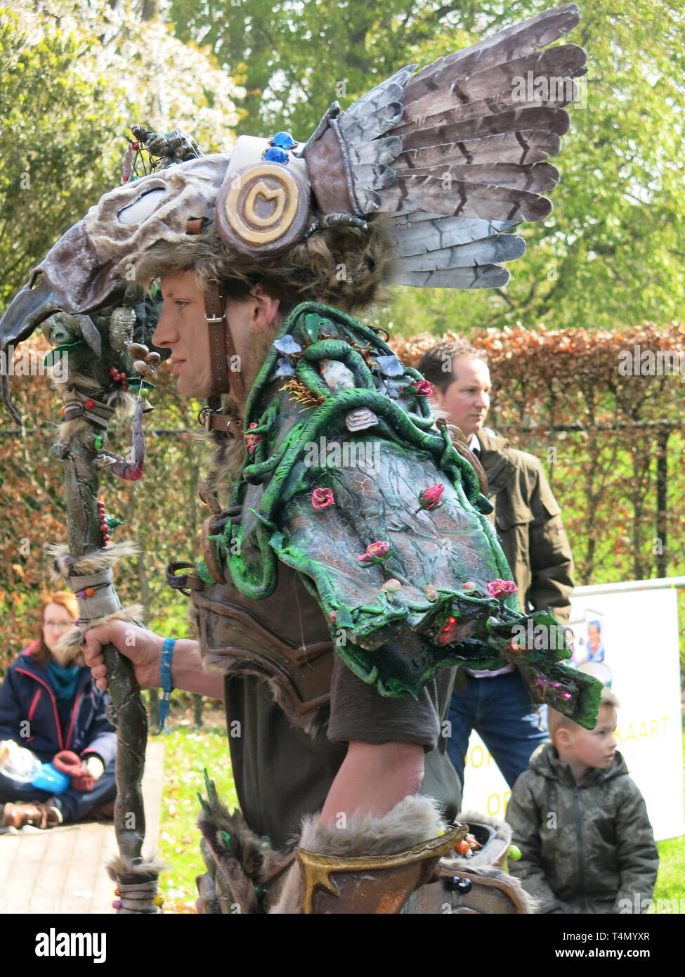 Young person with fancy-dress costume and head-dress attending the ...