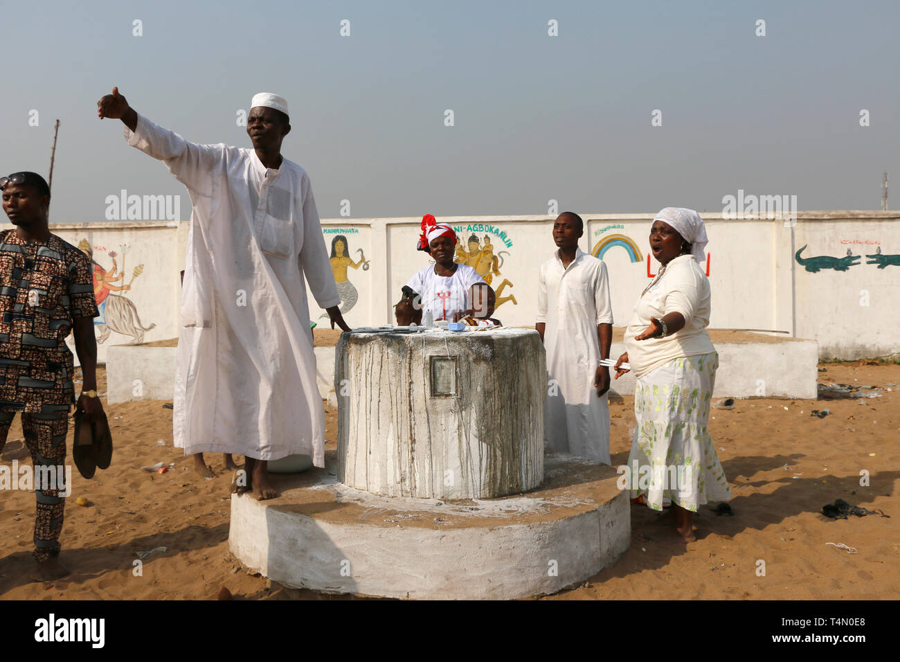 Voodoo people dressed in white clothes in Cotonou, Benin Stock Photo ...