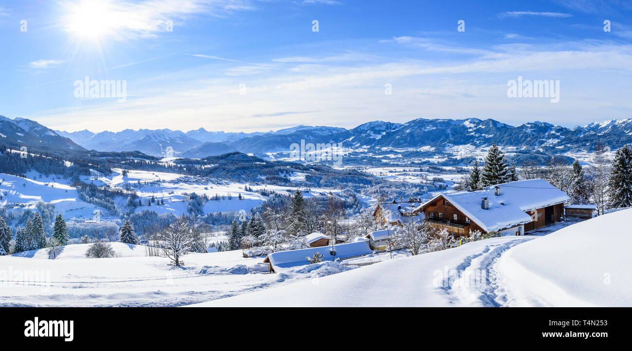 Farmhouse in impressive nature of the wintry Allgäu Alps Stock Photo ...