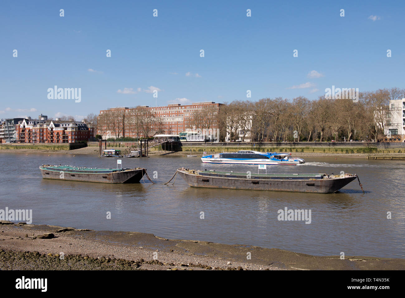 Barges on the River Thames near Dolphin Square, London Stock Photo - Alamy