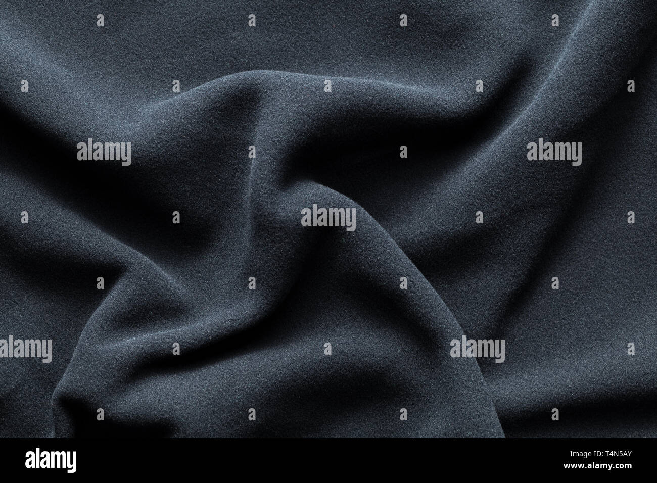 Texture of dark blue fleece, soft napped insulating fabric made of ...