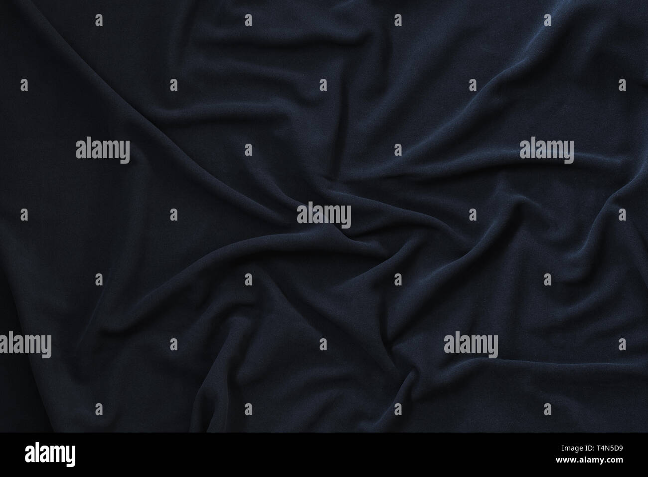Wavy texture of deep blue fleece, soft napped insulating fabric made of ...