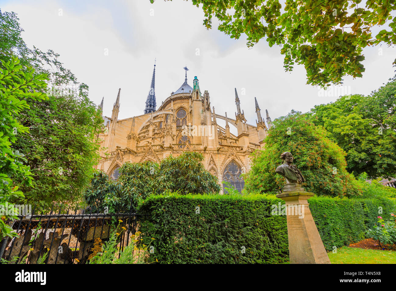 backside garden of Notre Dame de Paris, popular landmark and cathedral ...