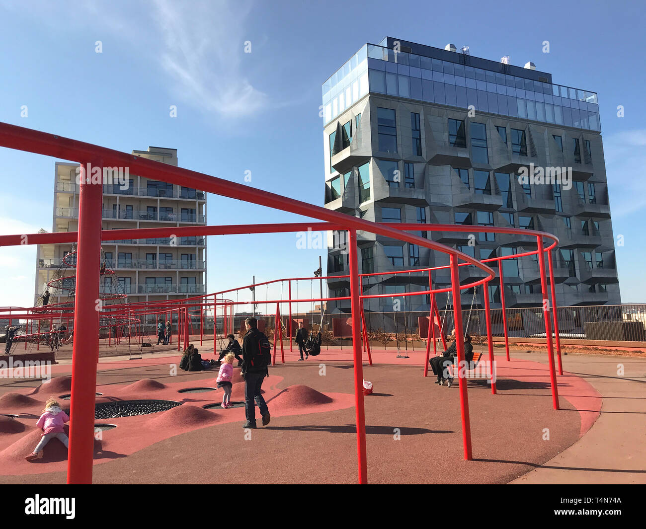 Modern playground with lots of activities and modern high rise ...