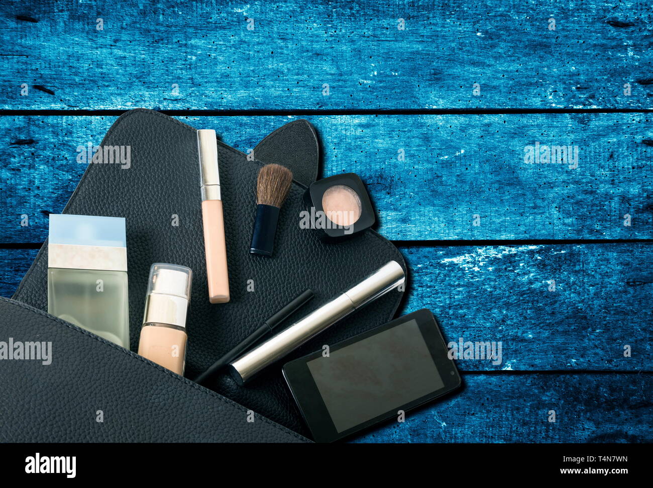 Cosmetics objects in the bag Stock Photo - Alamy
