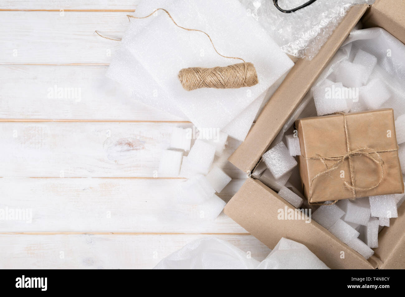 Packing products for delivery, shipping service Stock Photo - Alamy