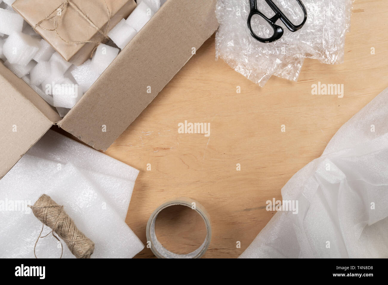 Packing products for delivery, shipping service Stock Photo - Alamy