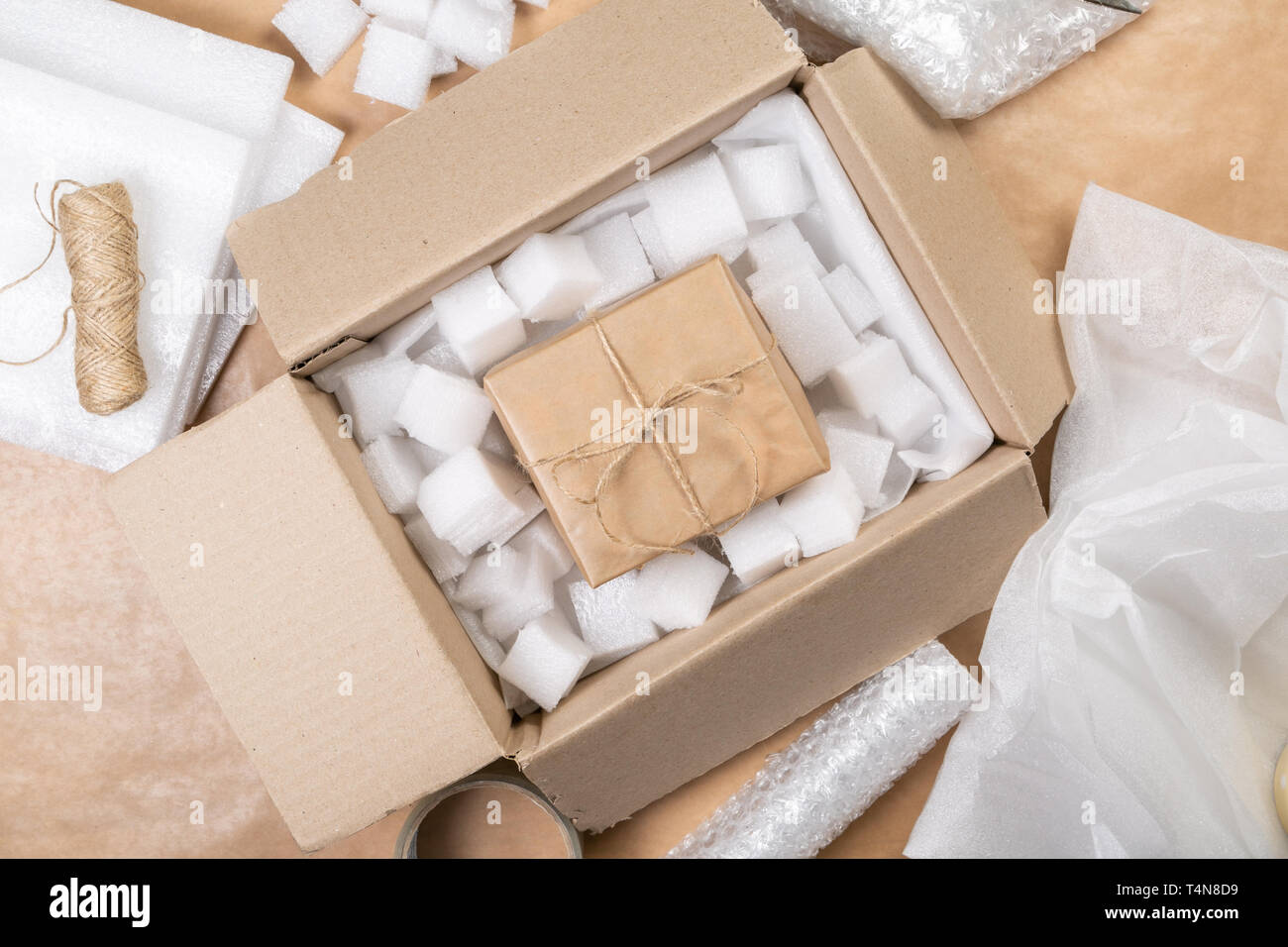 Packing products for delivery, shipping service Stock Photo - Alamy