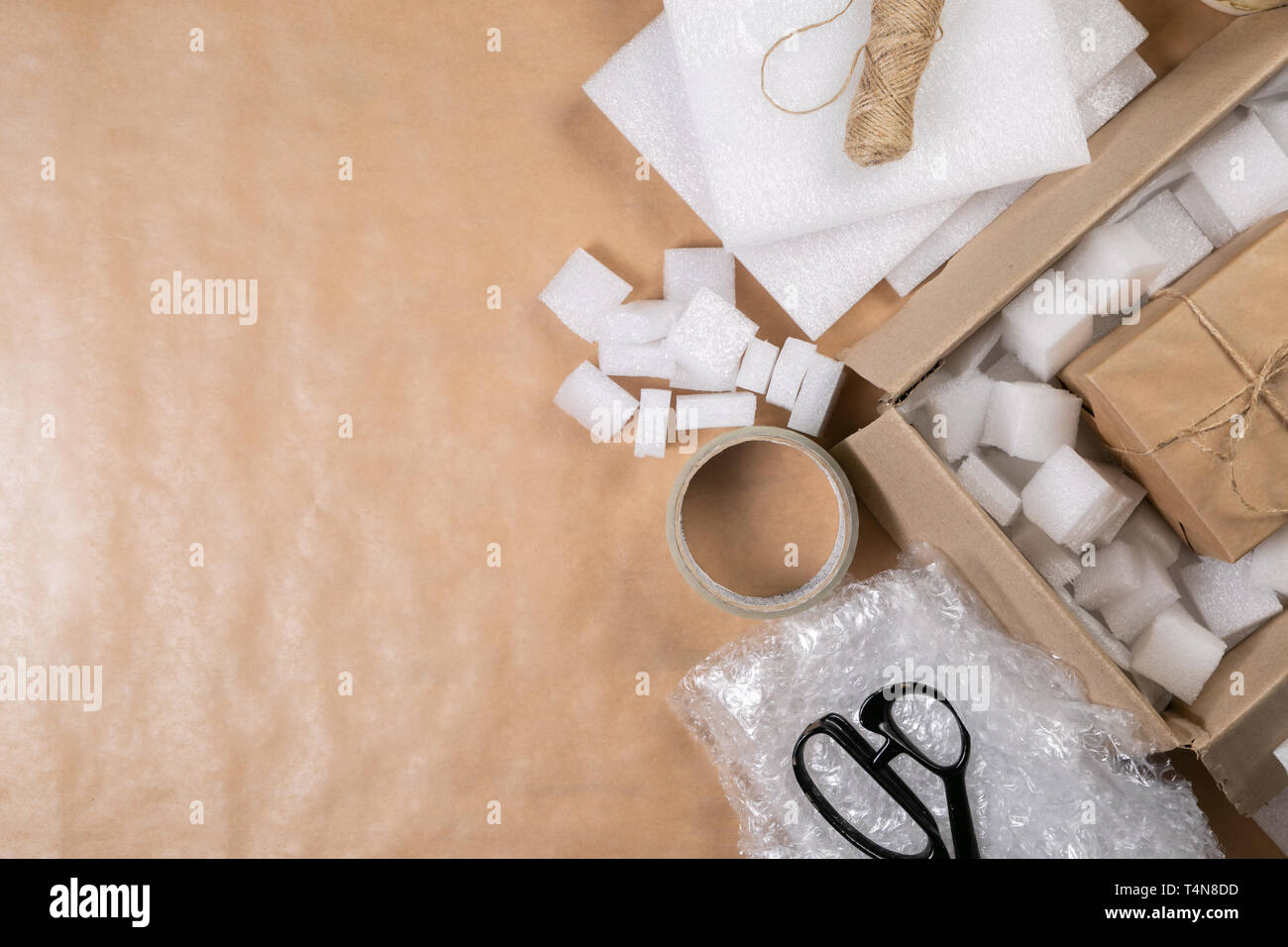 Packing products for delivery, shipping service Stock Photo - Alamy