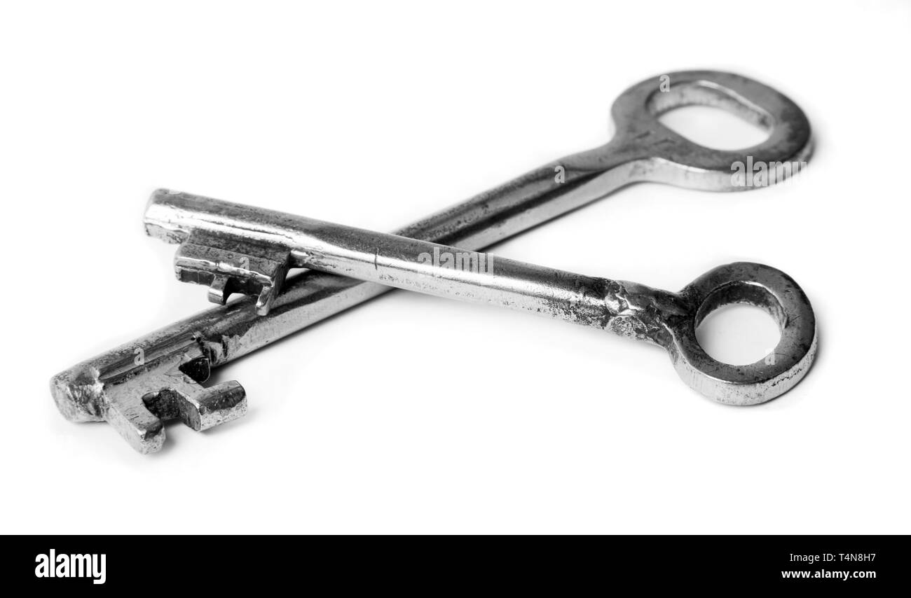Old iron keys on the white Stock Photo - Alamy