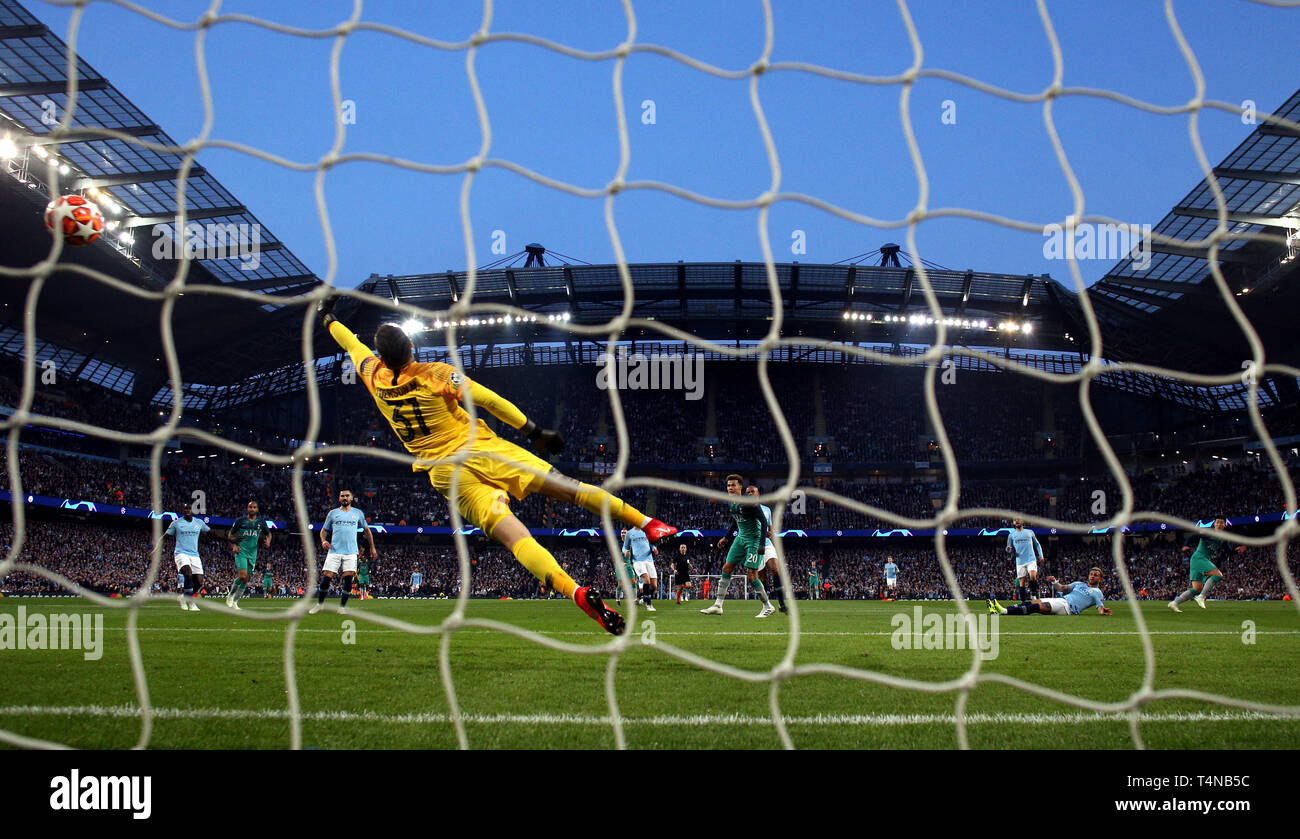 Manchester City goalkeeper Ederson dives in vain as Tottenham Hotspur's ...