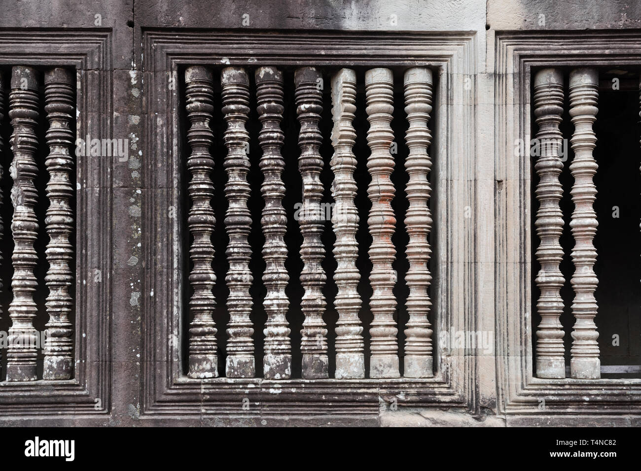 Traditional stone window slats at an ancient temple in Angkor Wat lcose ...