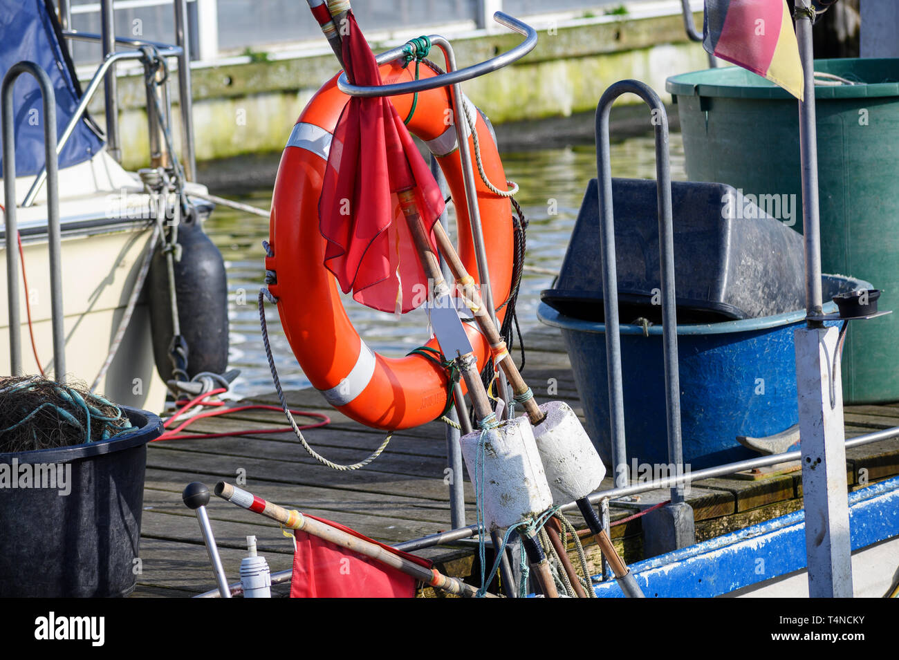 rescue ring and equipment on a traditional fishing boat Stock Photo - Alamy