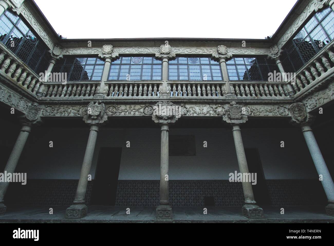 An old architecture with renewed windows Stock Photo - Alamy