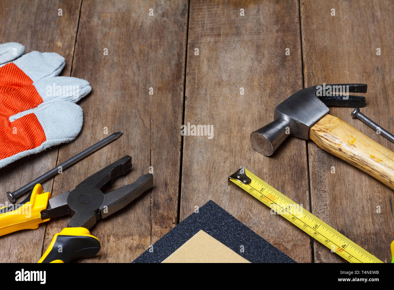 Construction instruments on wooden table Stock Photo - Alamy