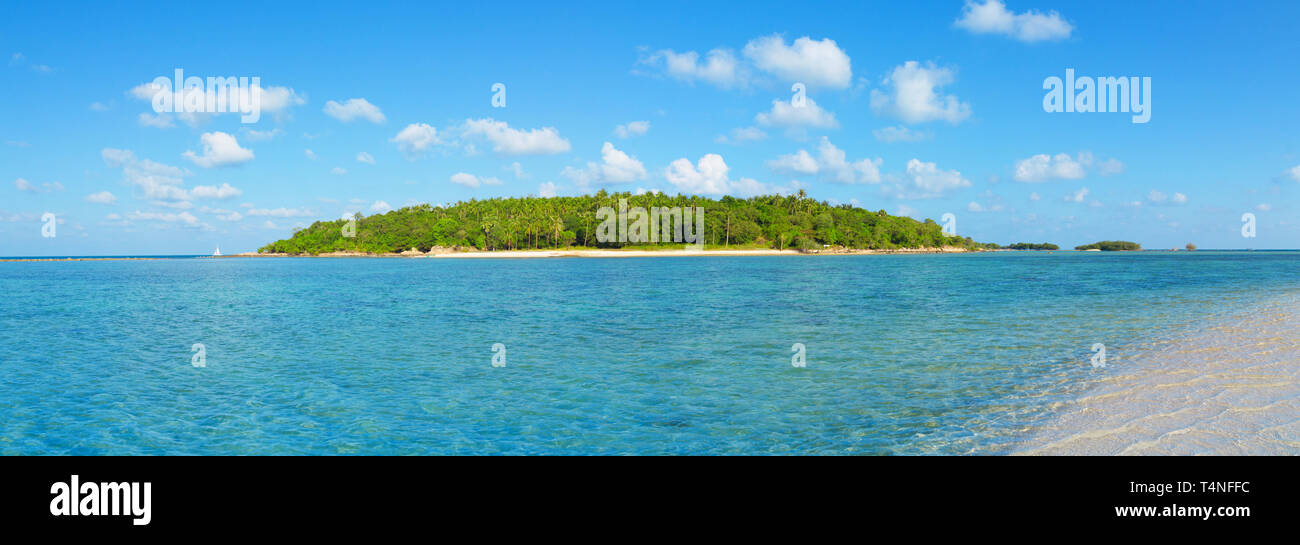Small tropical island panorama Stock Photo - Alamy