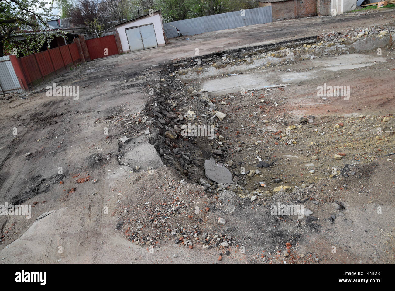 The ruined foundation of an old building, the walls of the basement of ...