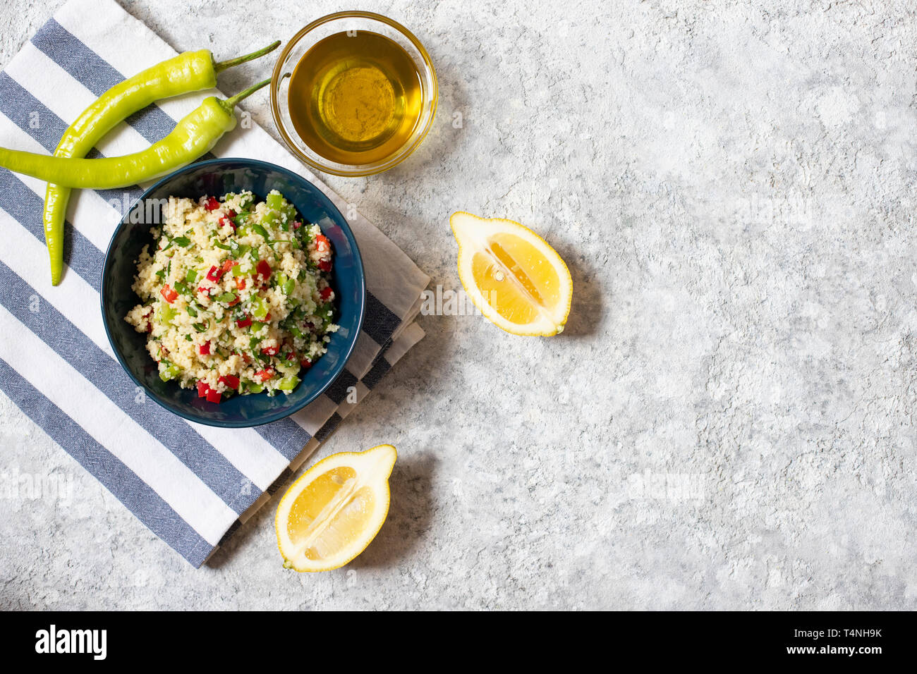 Tabbouleh salad with couscous, parsley, lemon, tomato, olive oil ...