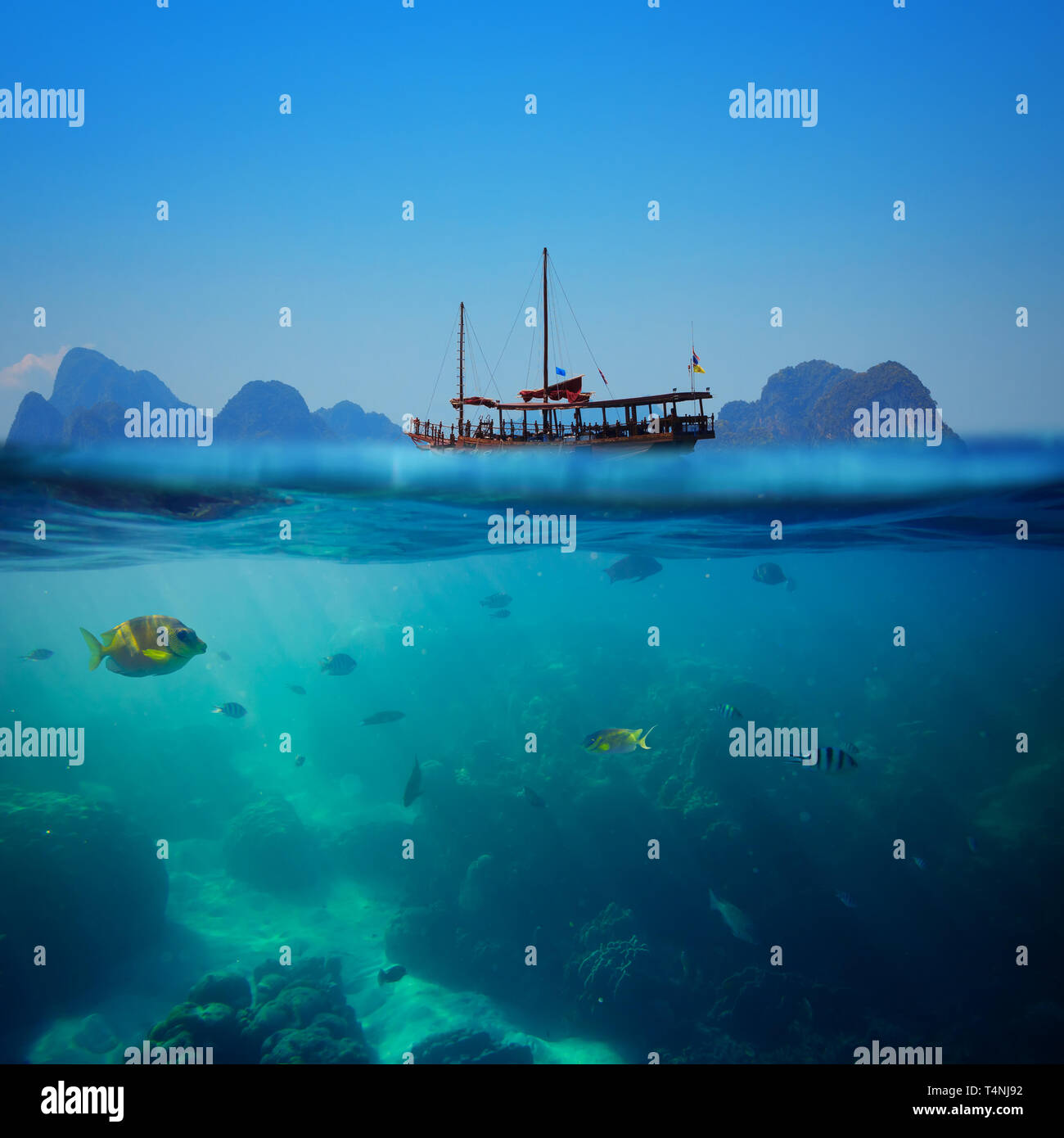 Tropical underwater shot splitted with ship and sky Stock Photo - Alamy