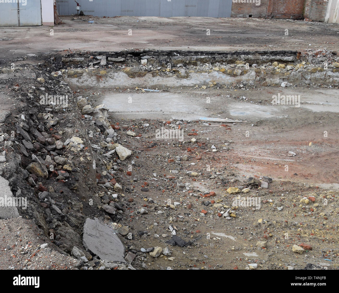 The ruined foundation of an old building, the walls of the basement of ...