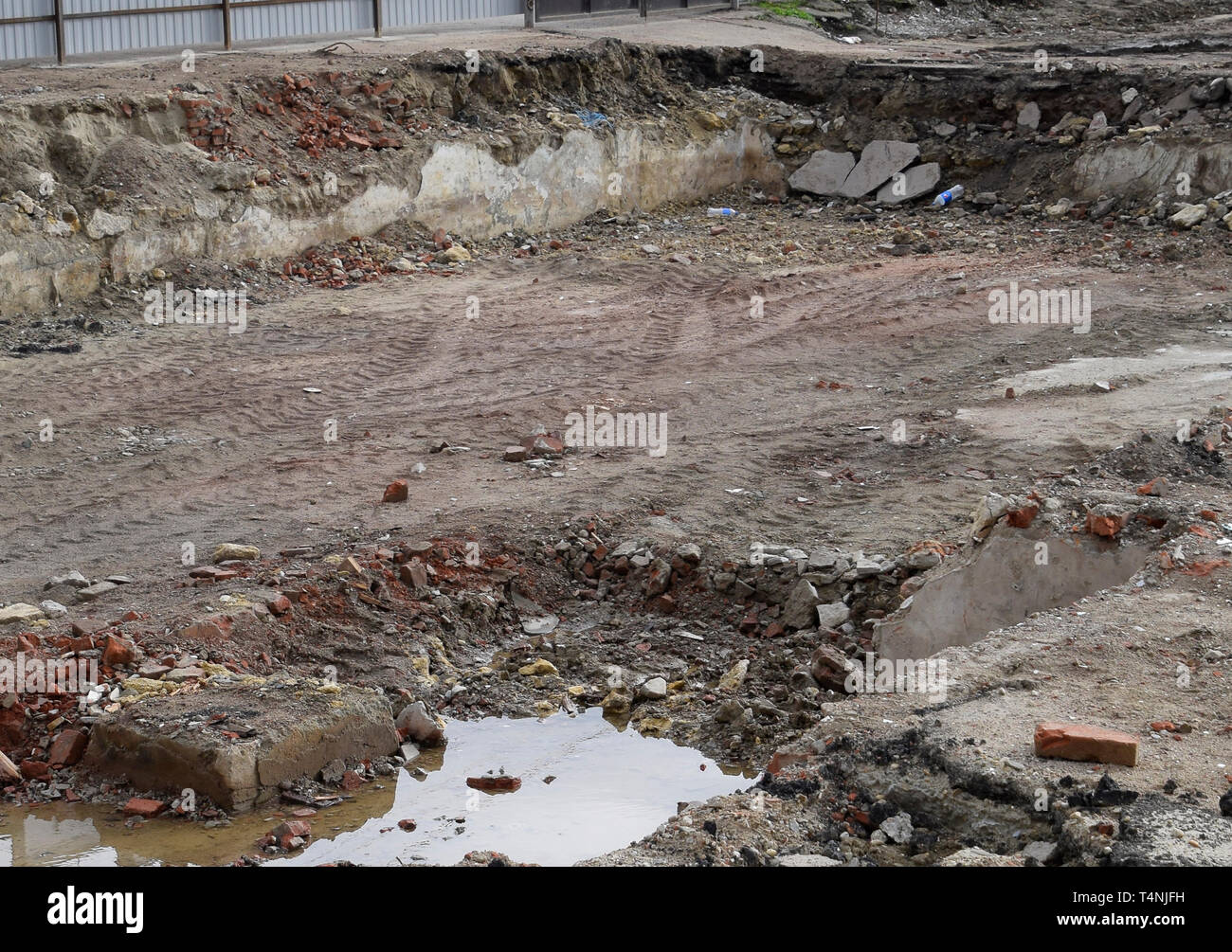 The ruined foundation of an old building, the walls of the basement of ...