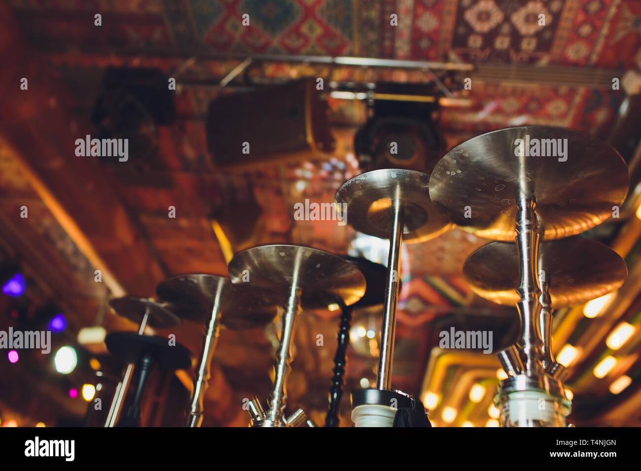 group of red hookahs shisha on table in interior Stock Photo - Alamy