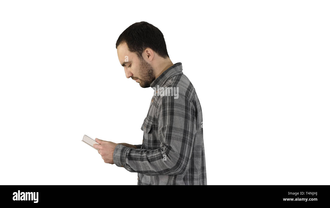 Medium shot side view. Tablet computer Side view of man using digital ...