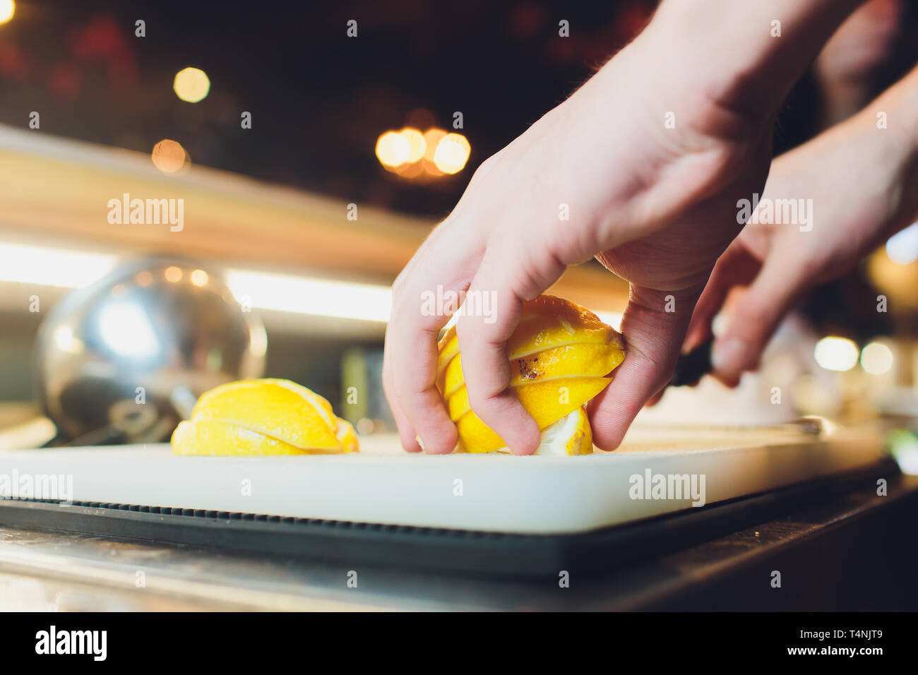 Cut lemon peels into strips. Candied Lemon Zest Cooking. Series Stock ...