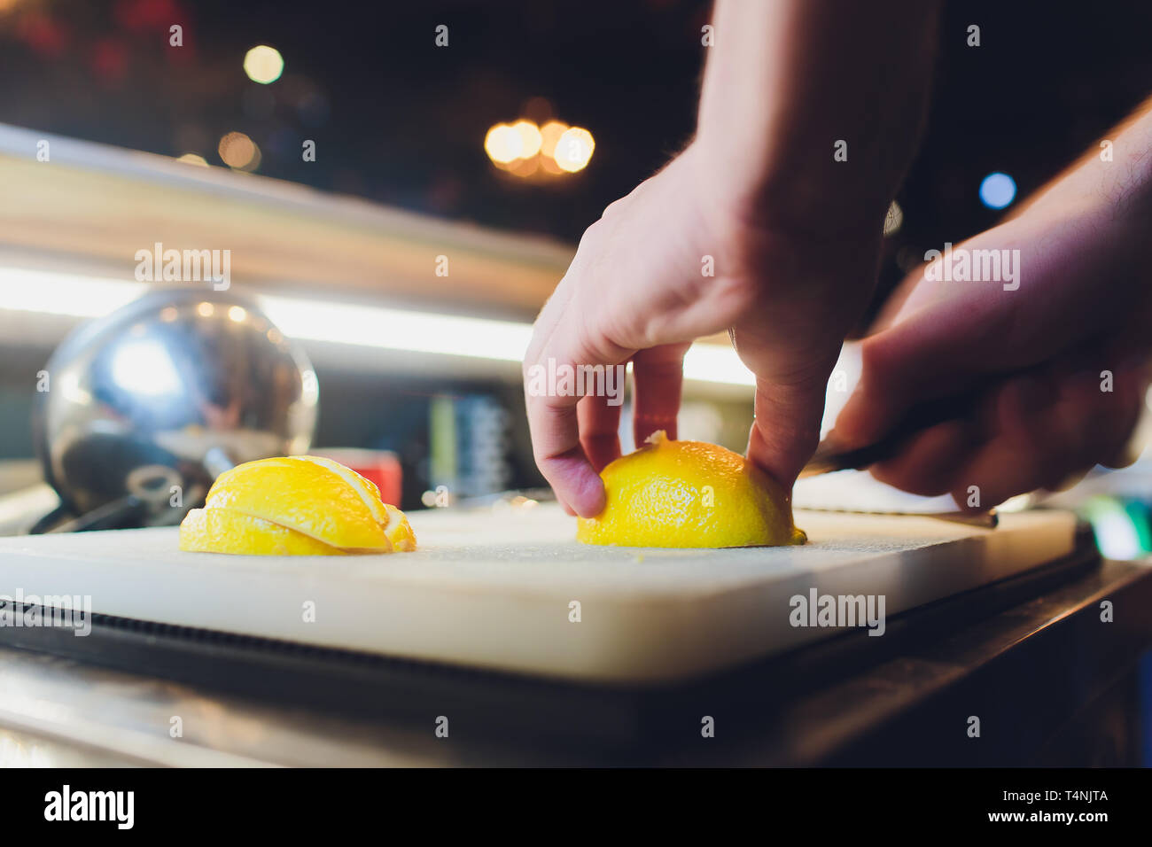 Cut lemon peels into strips. Candied Lemon Zest Cooking. Series Stock ...