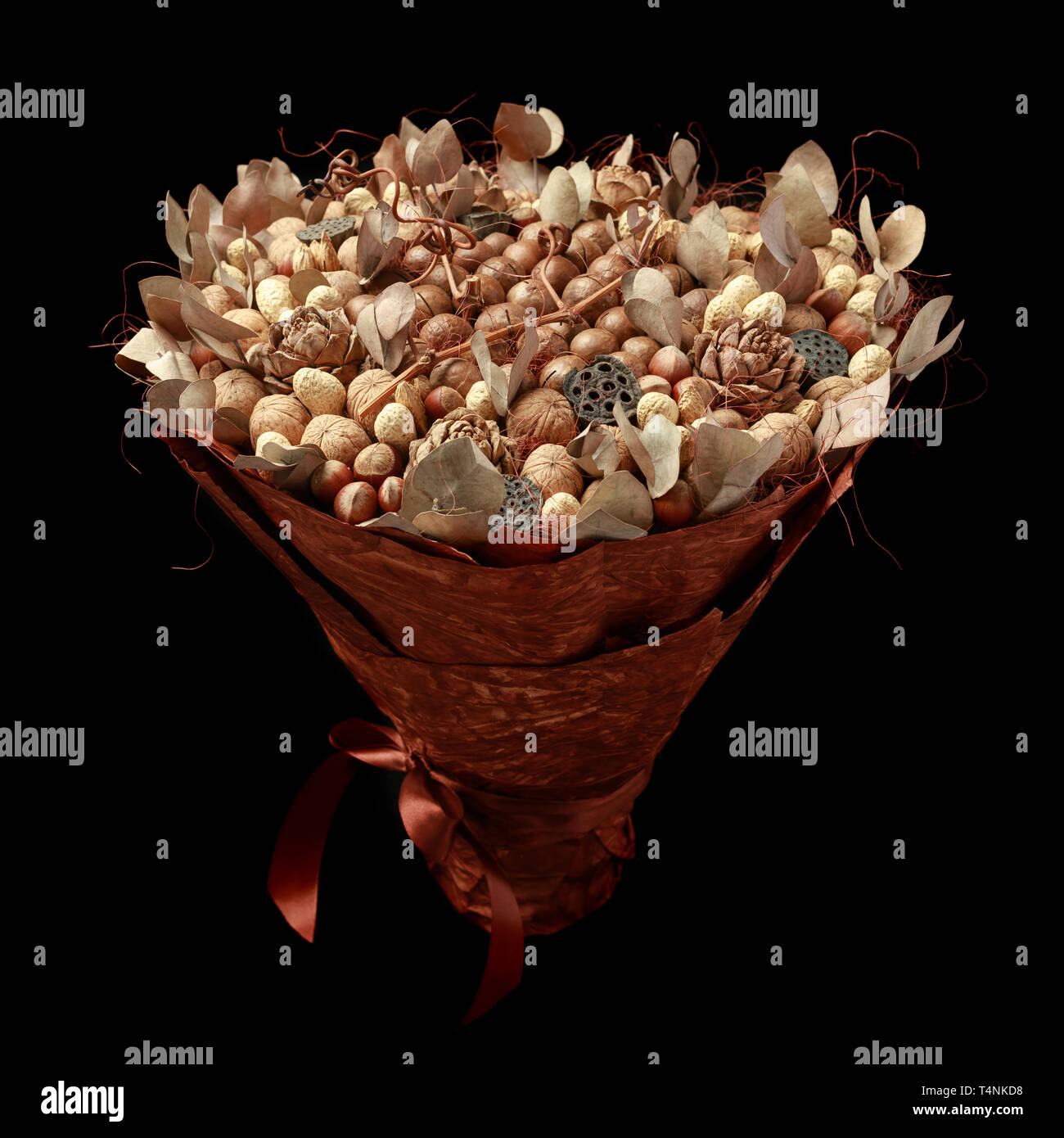 Unique bouquet made up of different types of nuts, decorated with ...