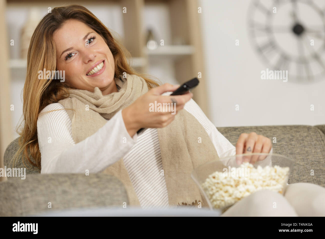 Woman television remote control hi-res stock photography and images - Alamy