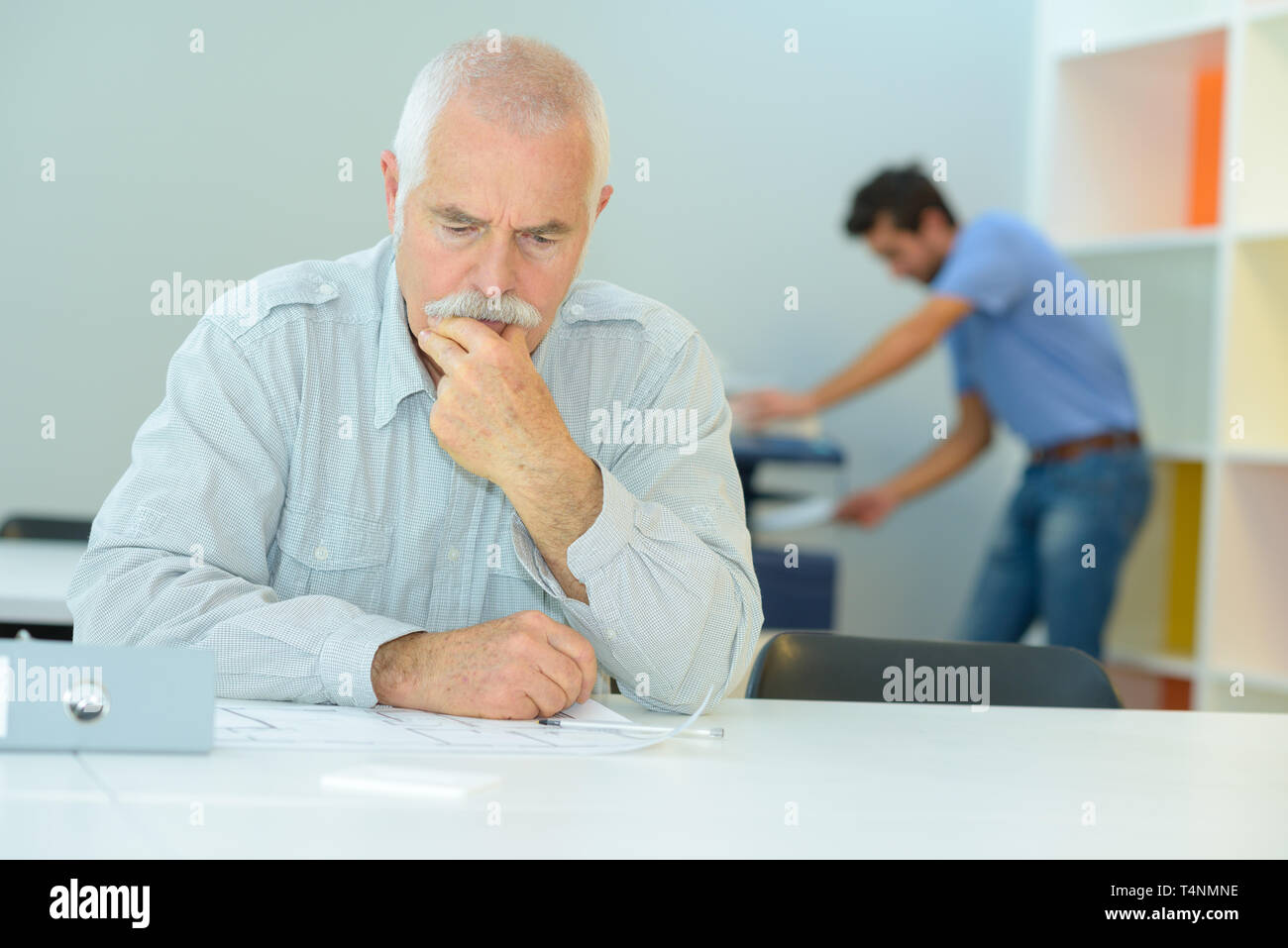 Senior businessman taking notes hi-res stock photography and images - Alamy