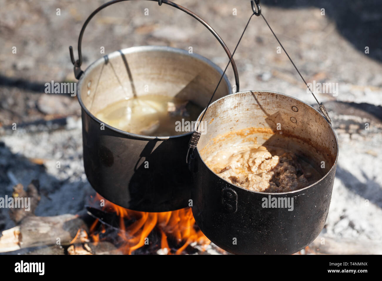 Cooking in sooty cauldron hi-res stock photography and images - Alamy