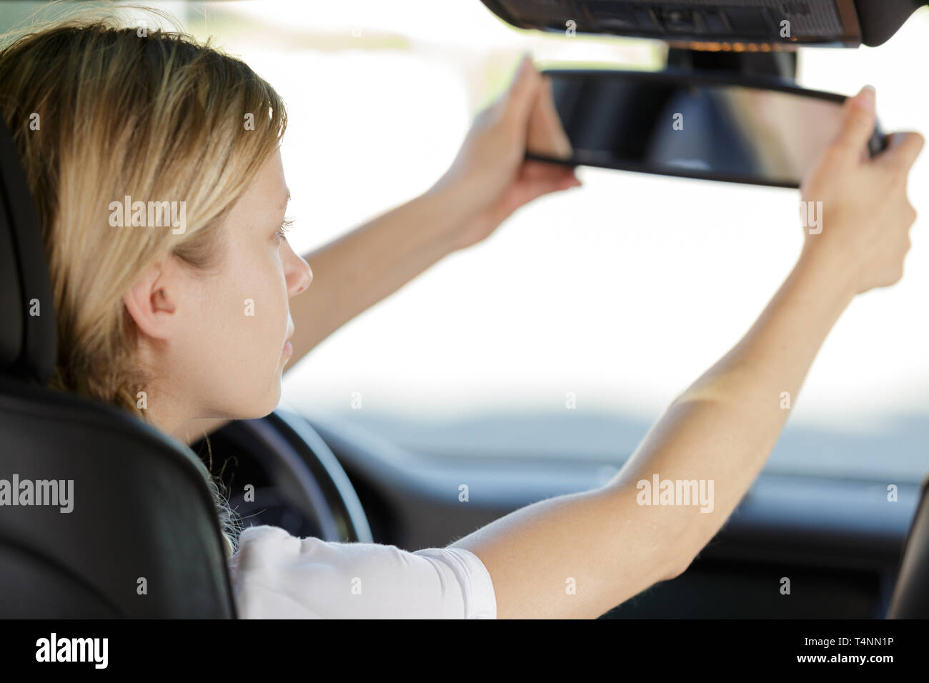 Looking in rear view mirror hi-res stock photography and images - Alamy
