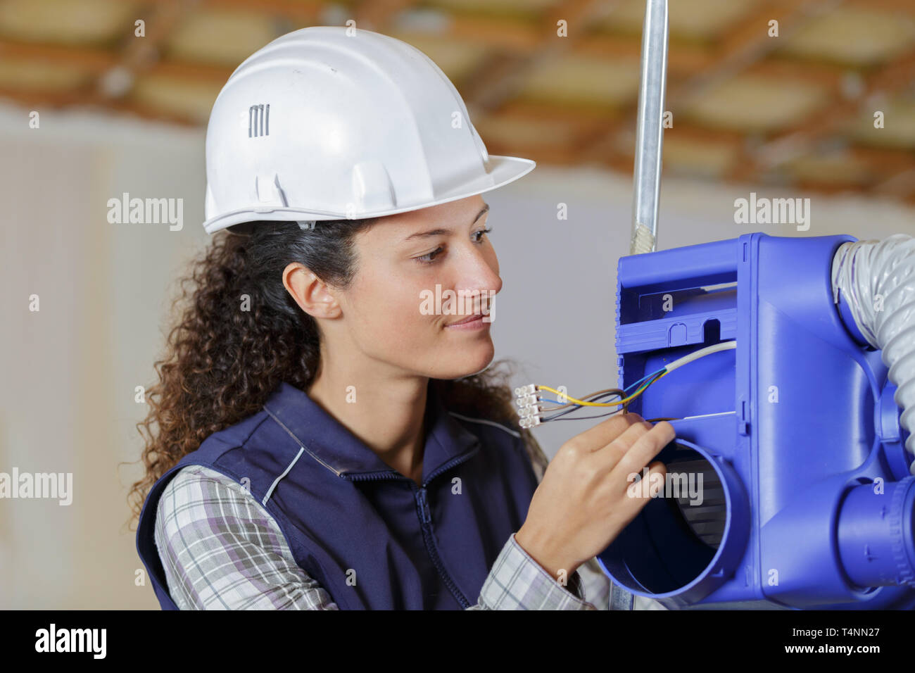 installing a ventilation box Stock Photo - Alamy