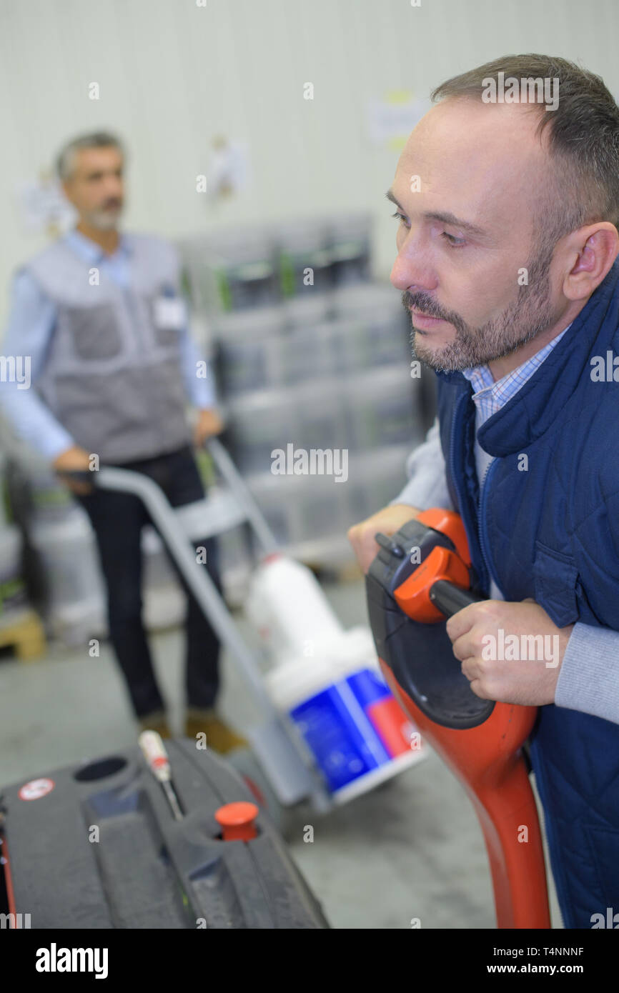 Worker trolley in large hi-res stock photography and images - Alamy