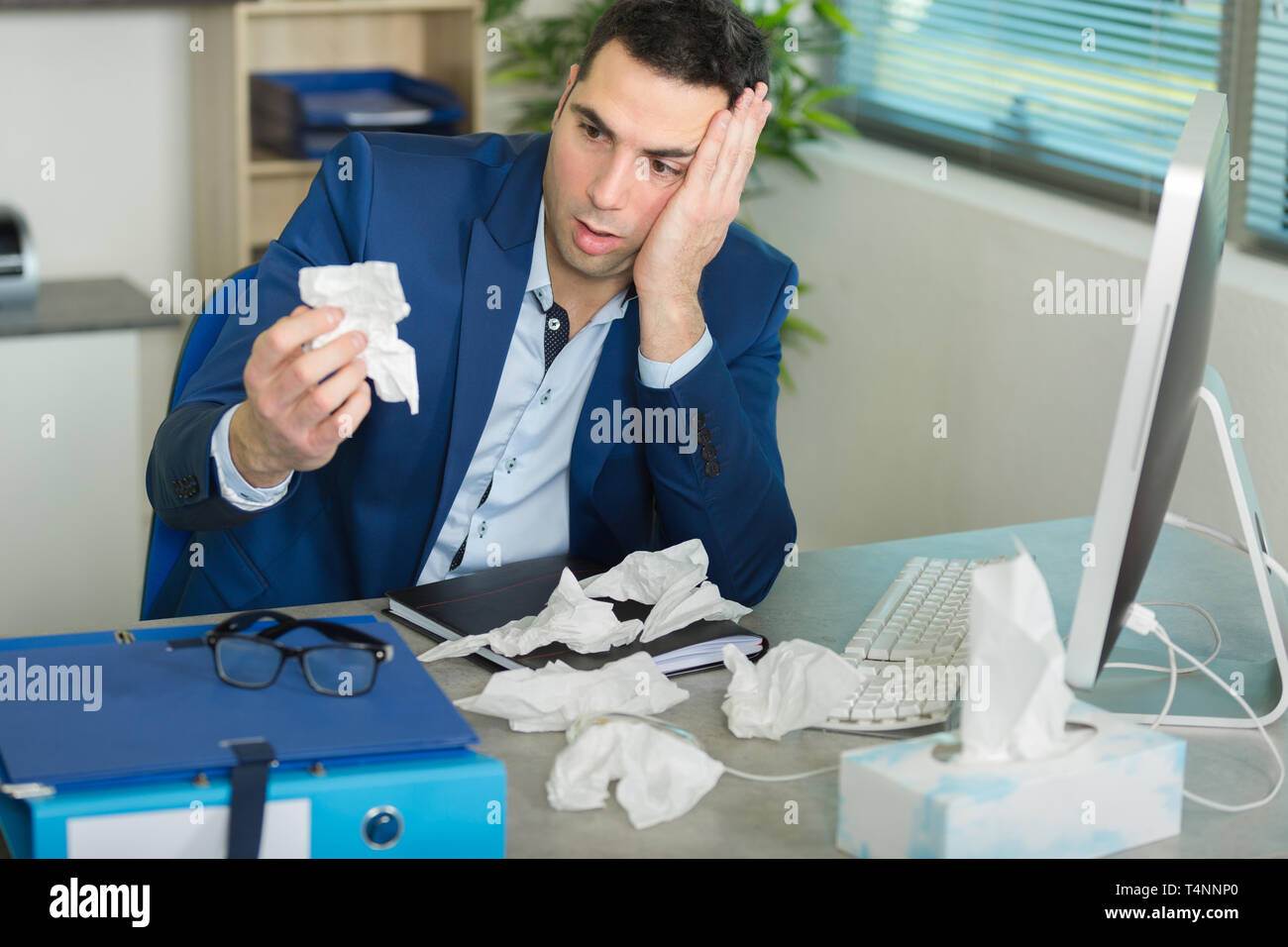 sad man in the office Stock Photo - Alamy