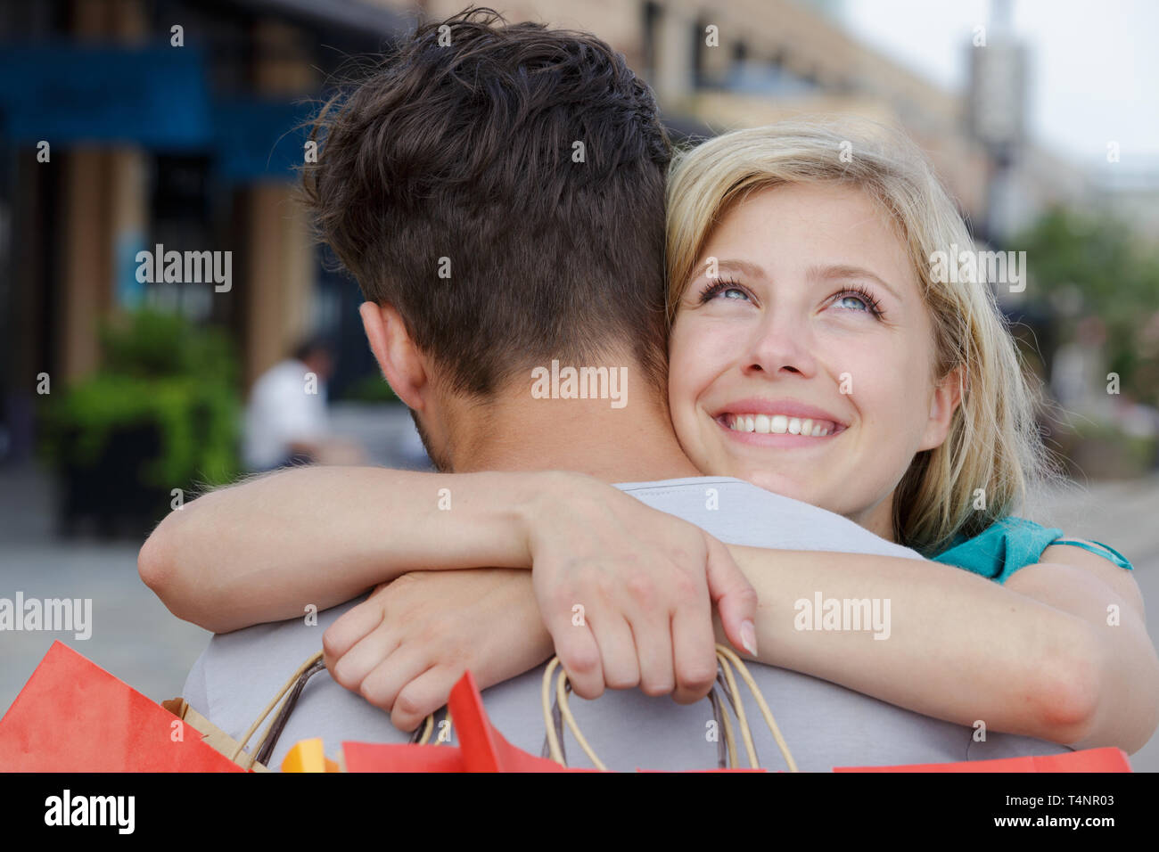 couple hugging in the street Stock Photo - Alamy