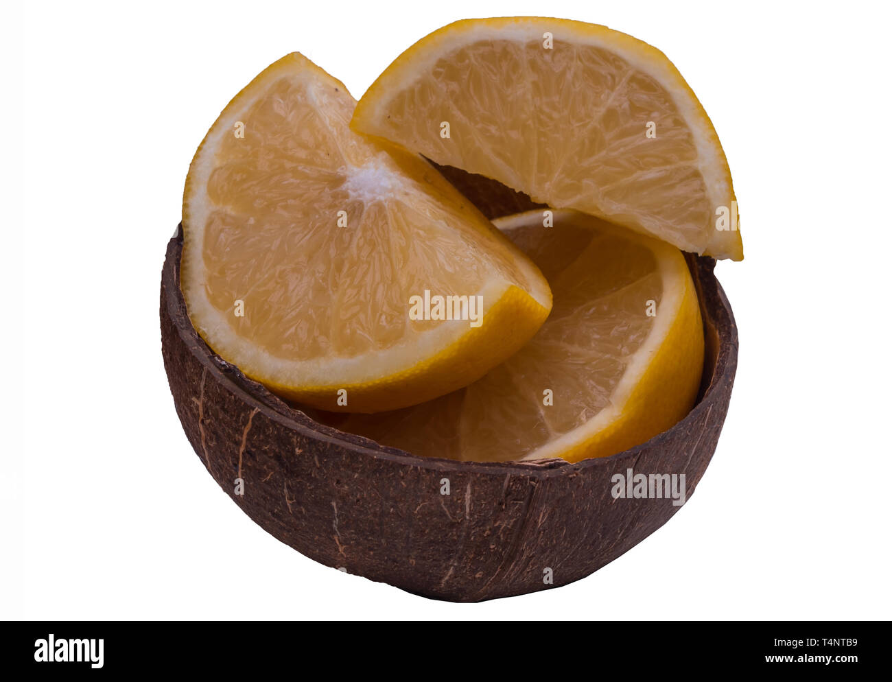 Fresh Grapefruit in a coconut shell on a white background Stock Photo ...