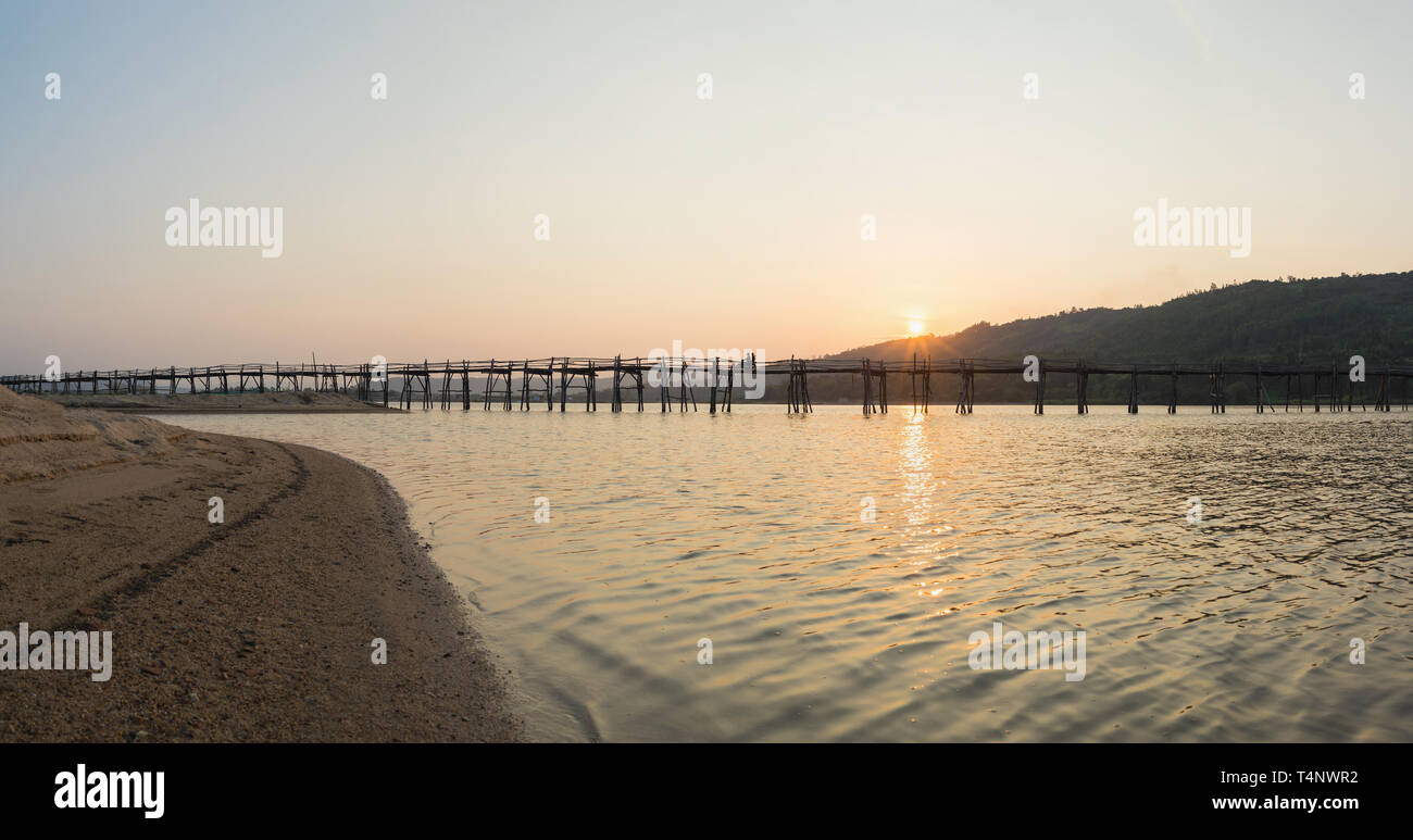 Panorama viewe of Ong Cop bridge by sunset period, the longest wooden ...