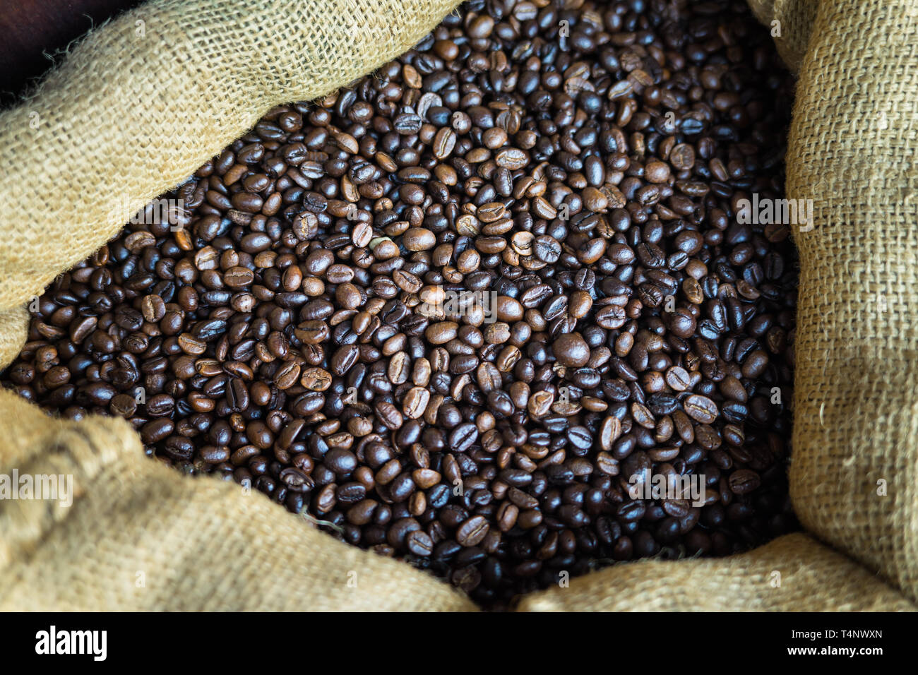 Coffee seeds in bags. Vietnamese traditional coffee Stock Photo - Alamy