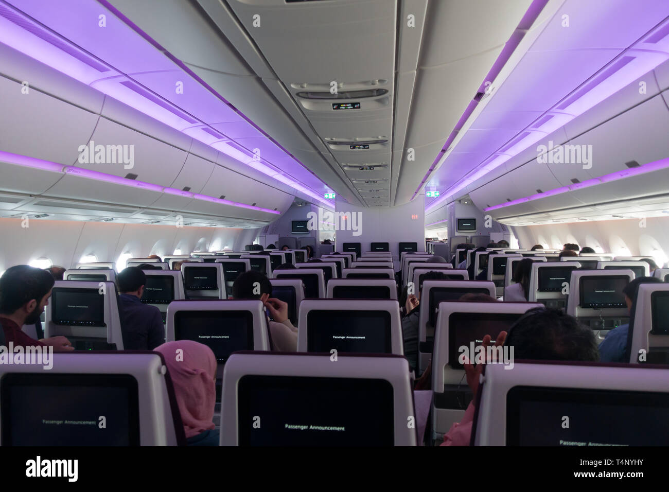 Inside passenger cabin of jet airliner Stock Photo - Alamy